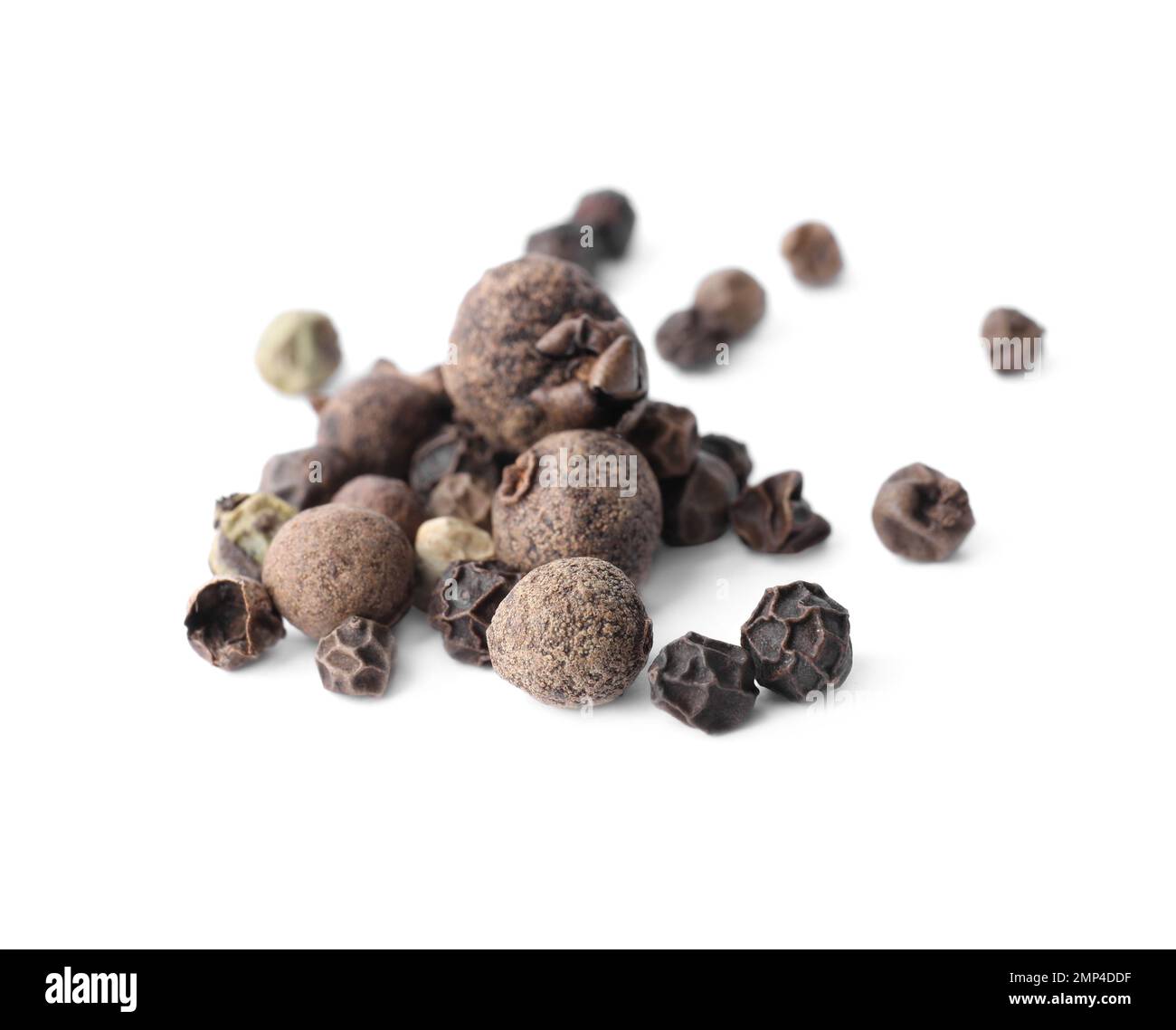 Mix of different pepper grains isolated on white Stock Photo - Alamy