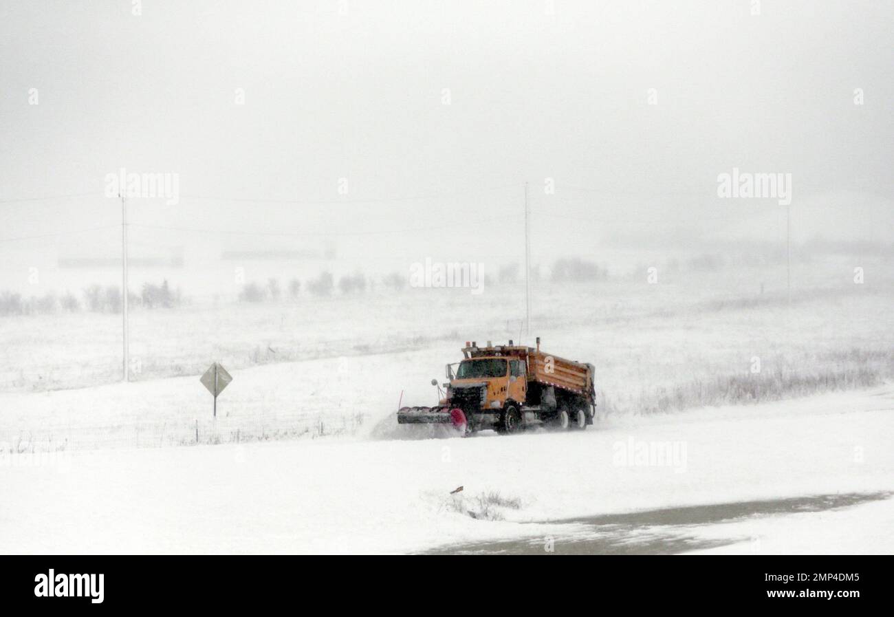 A snow plow clears an off-ramp of snow on Highway 275 near Valley, Neb ...