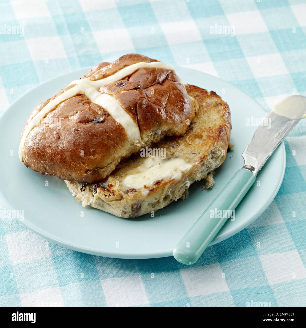hot cross buns buttered sliced open toasted easter traditional gingham ...