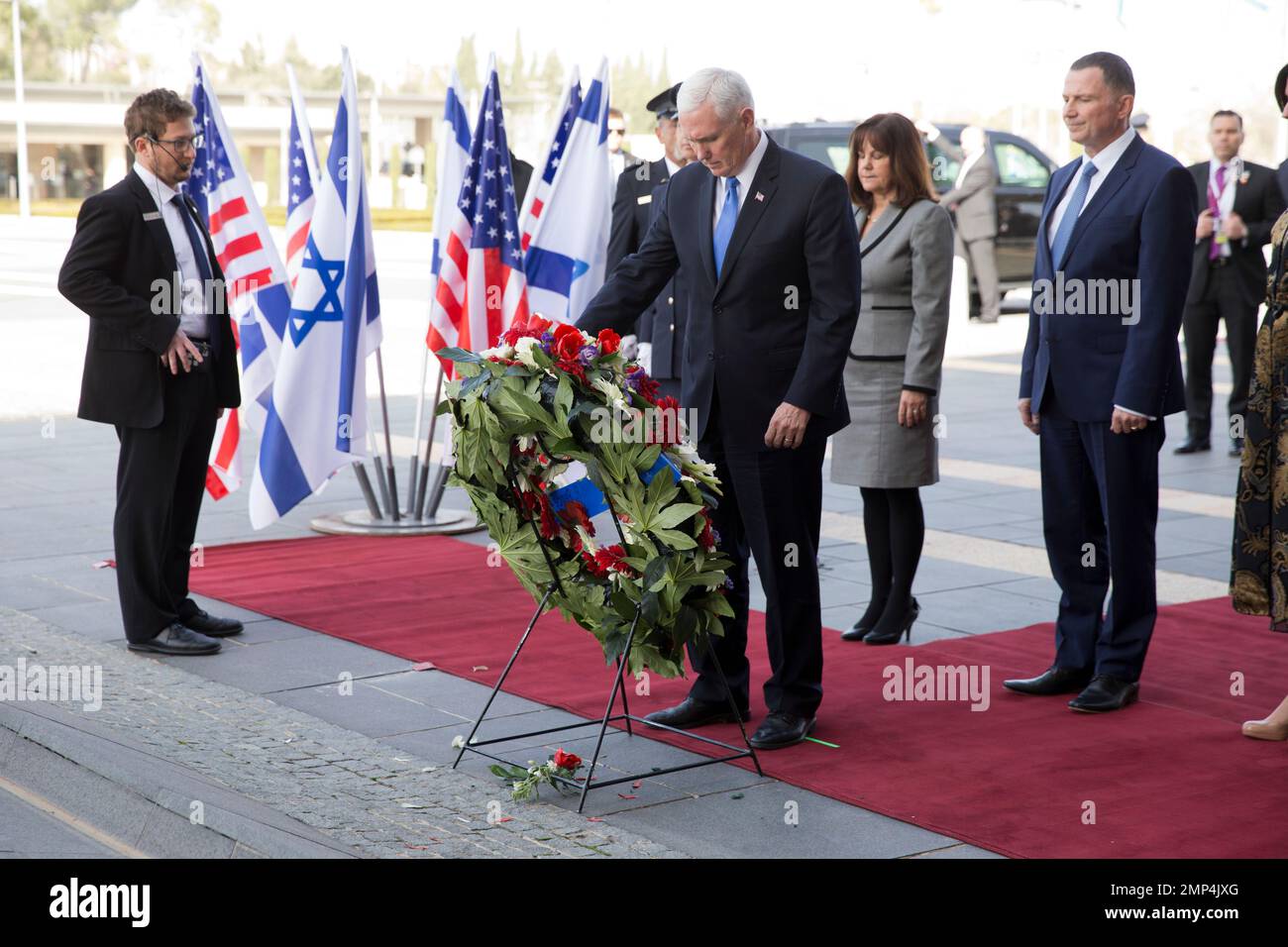 U.S. Vice President Mike Pence lays a wreath at the memorial for fallen ...
