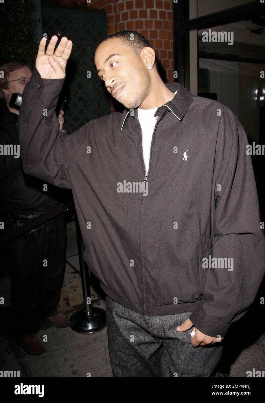 Grammy award-winning rapper and actor Ludacris salutes the crowd as he ...