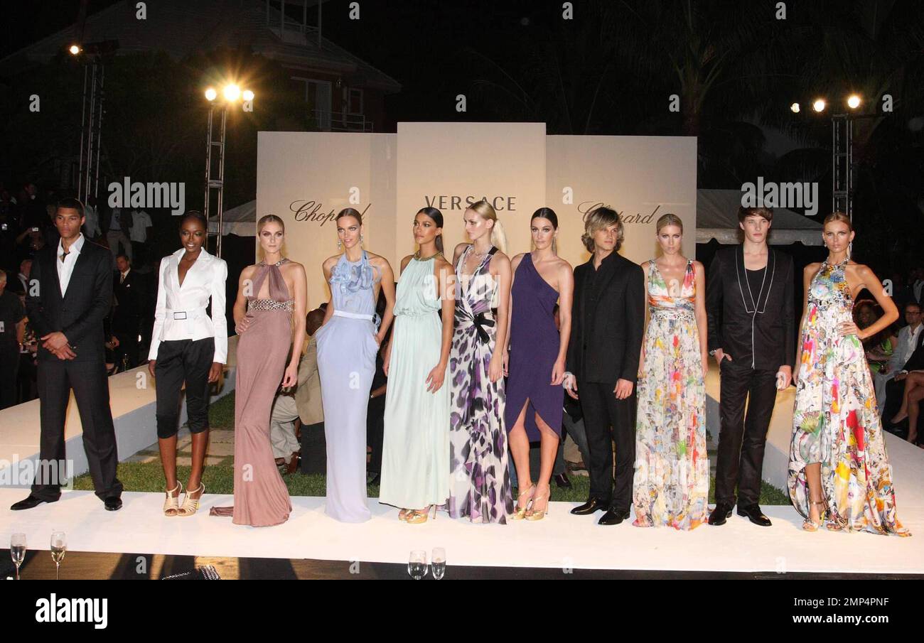 Models walk the runway during the Versace and Chopard Fashion Show at ...