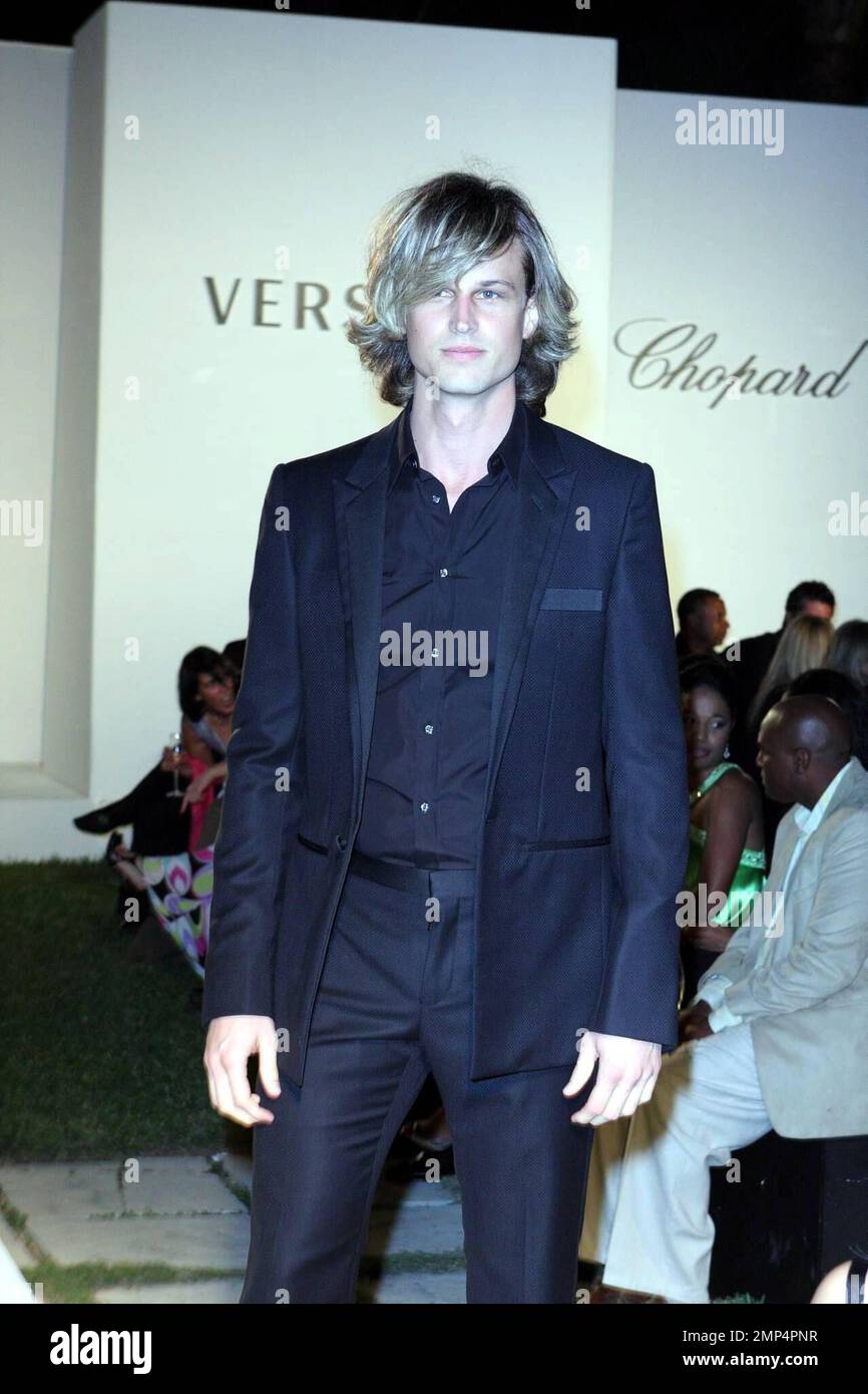 Models walk the runway during the Versace and Chopard Fashion Show at ...
