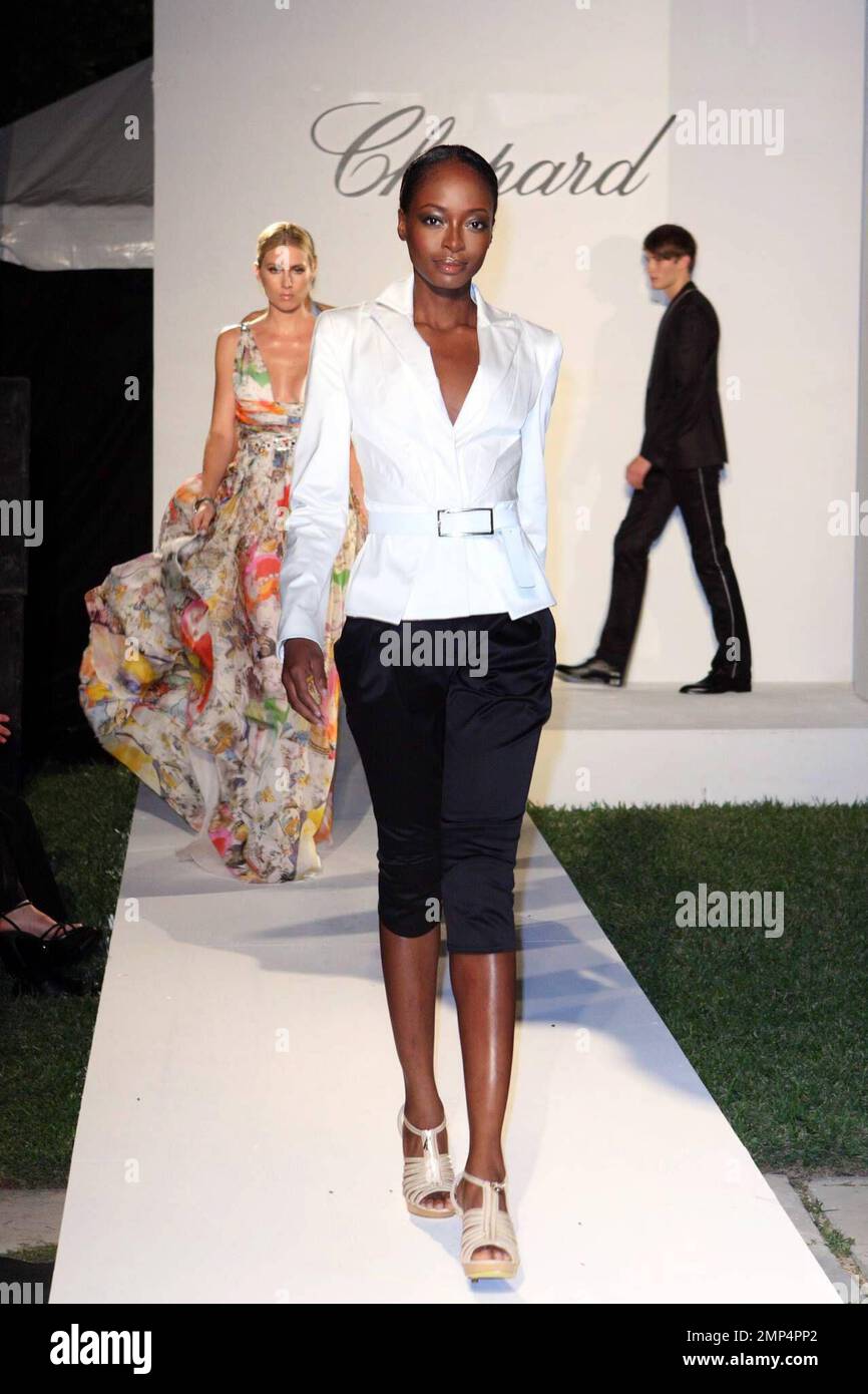 Models walk the runway during the Versace and Chopard Fashion Show at ...