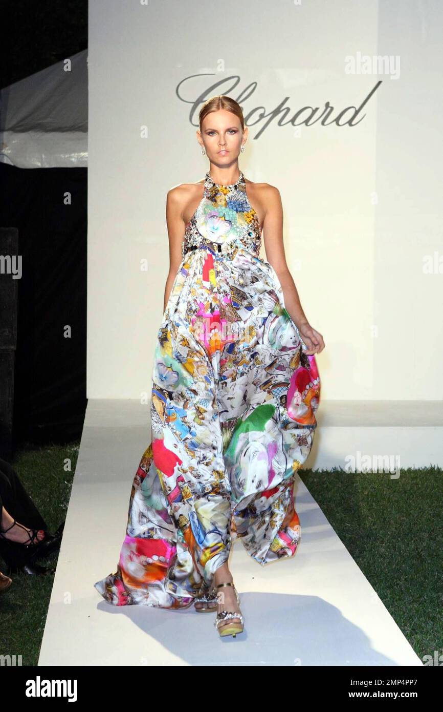 Models walk the runway during the Versace and Chopard Fashion Show at ...