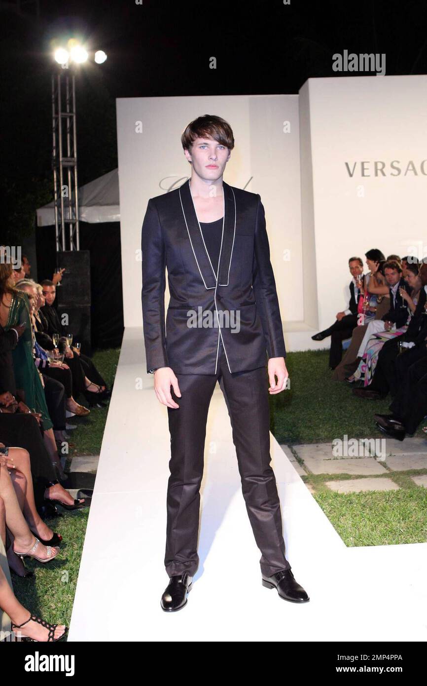 Models walk the runway during the Versace and Chopard Fashion Show at ...
