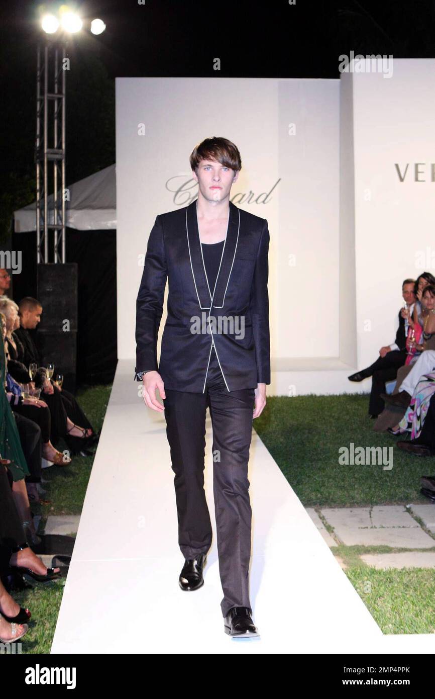 Models walk the runway during the Versace and Chopard Fashion Show at ...