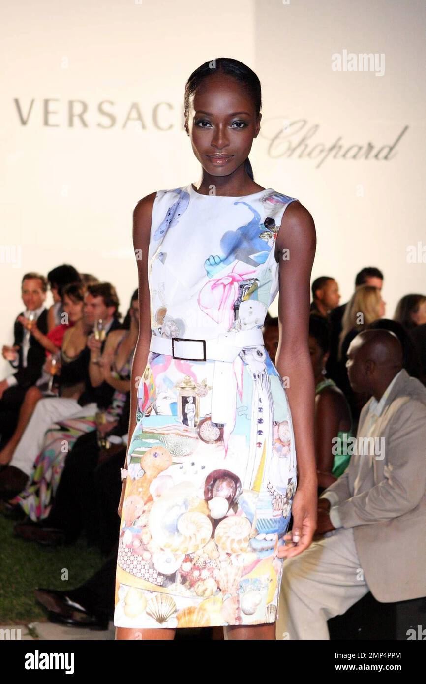 Models walk the runway during the Versace and Chopard Fashion Show at ...