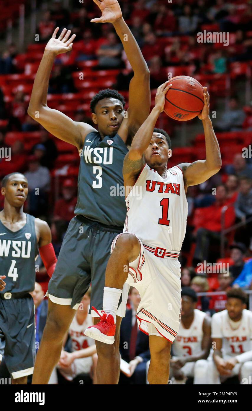 Utah guard Justin Bibbins (1) goes to the basket as Washington State ...