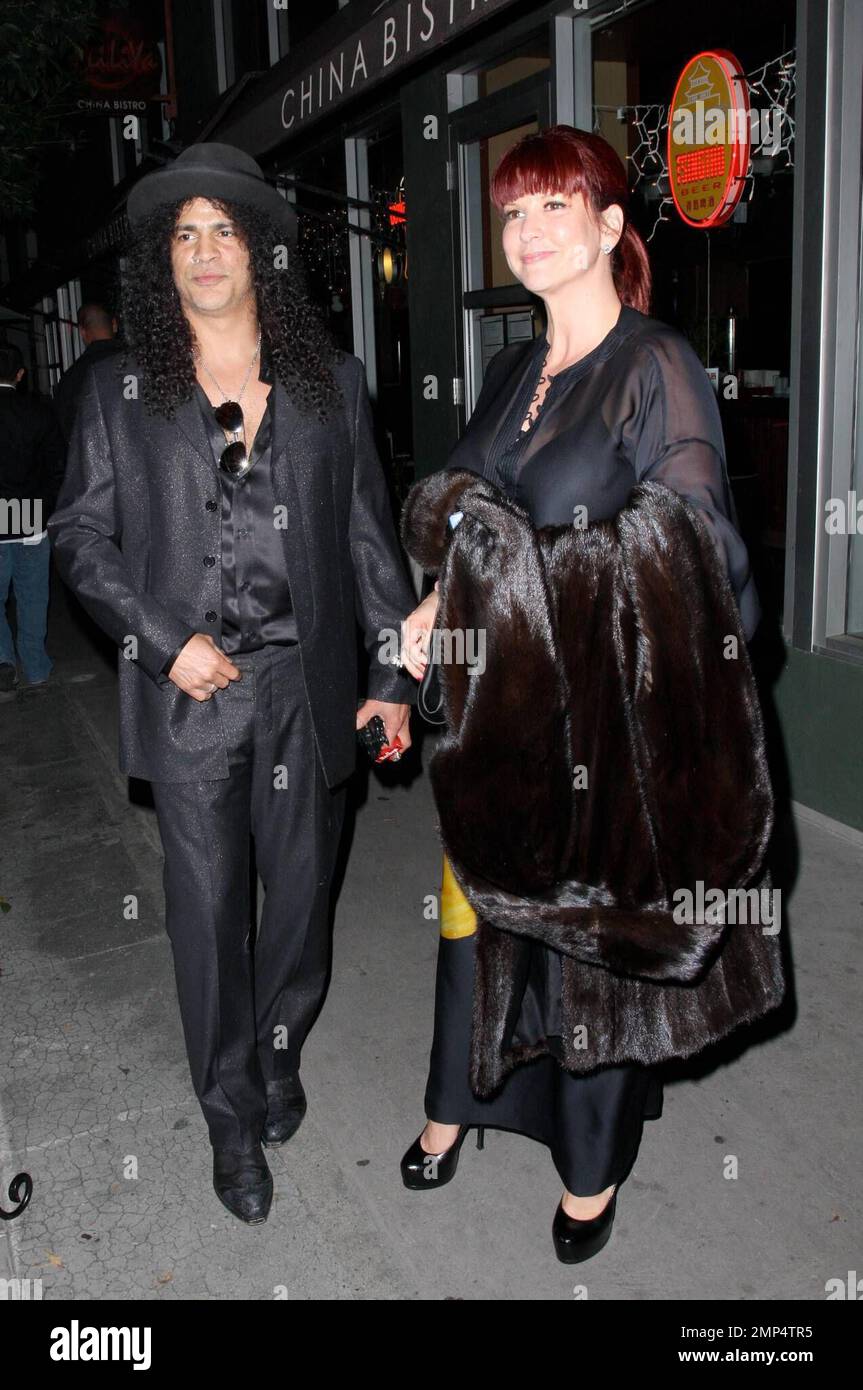 Velvet Revolver guitarist Slash and his wife Perla Ferrar attend rocker ...