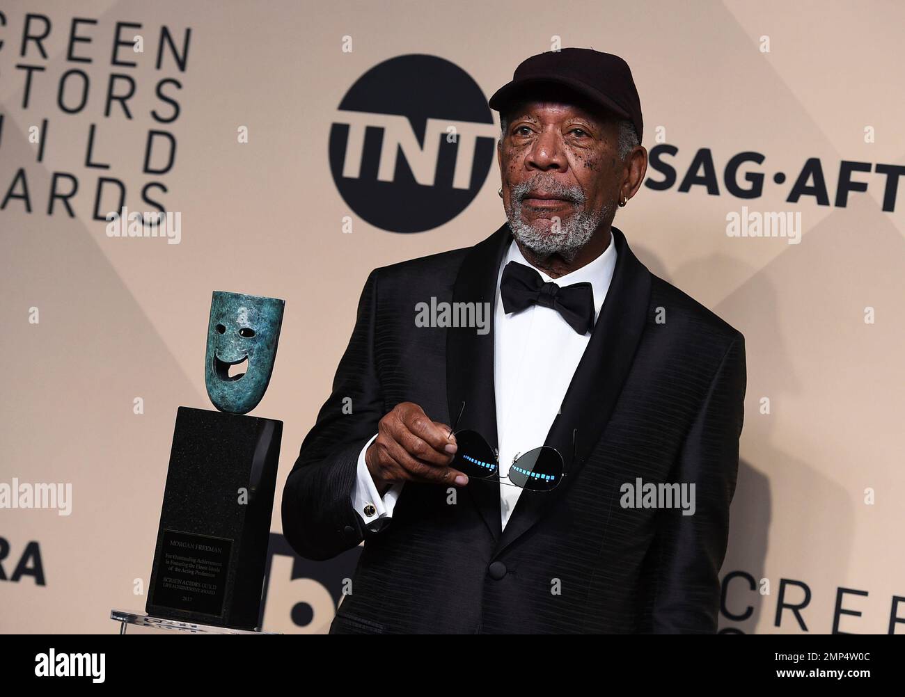 Morgan Freeman poses with his Life Achievement Award in the press room ...