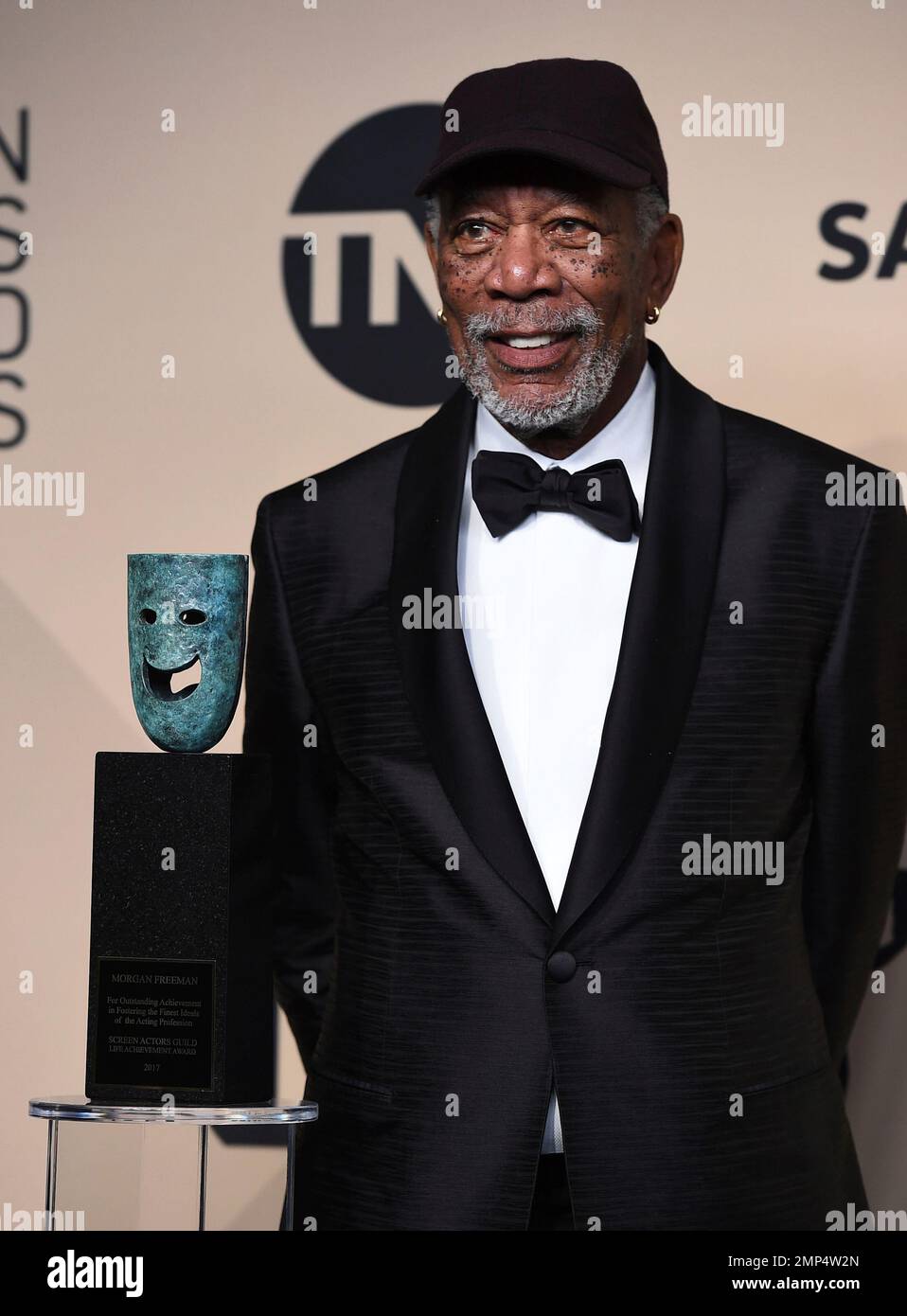 Morgan Freeman poses with his Life Achievement Award in the press room ...