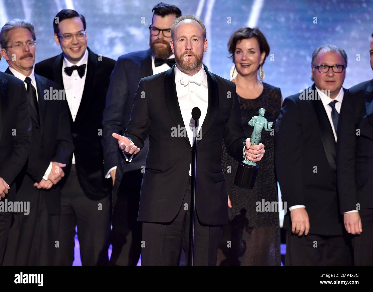 Matt Walsh, center, accepts the award for outstanding ensemble in a ...