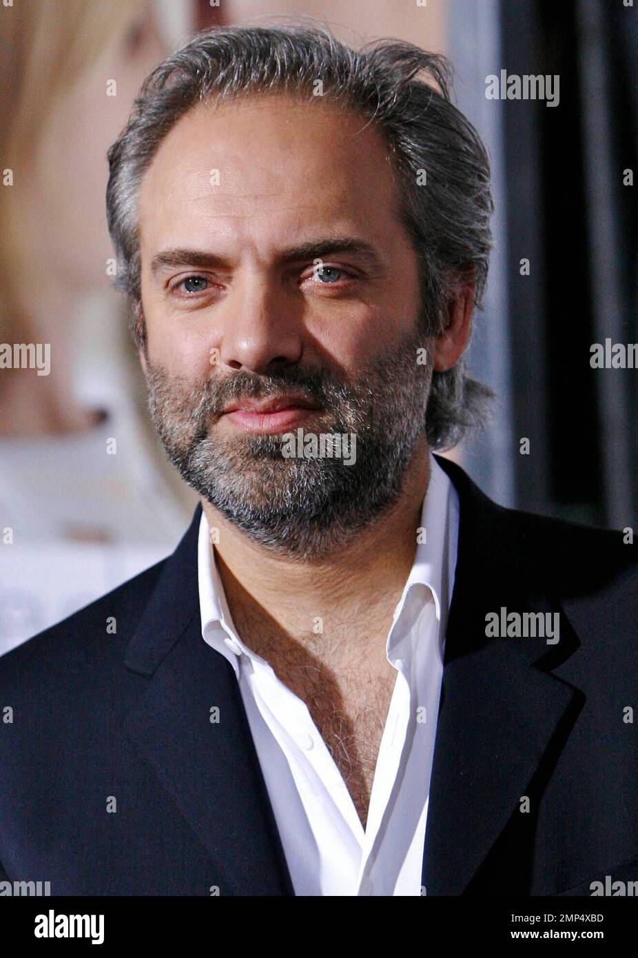 Sam Mendes arrives at the World Premiere of Revolutionary Road at Mann ...