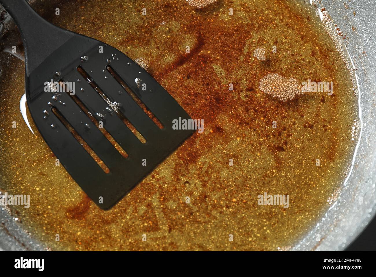 Pouring used cooking oil hi-res stock photography and images - Alamy