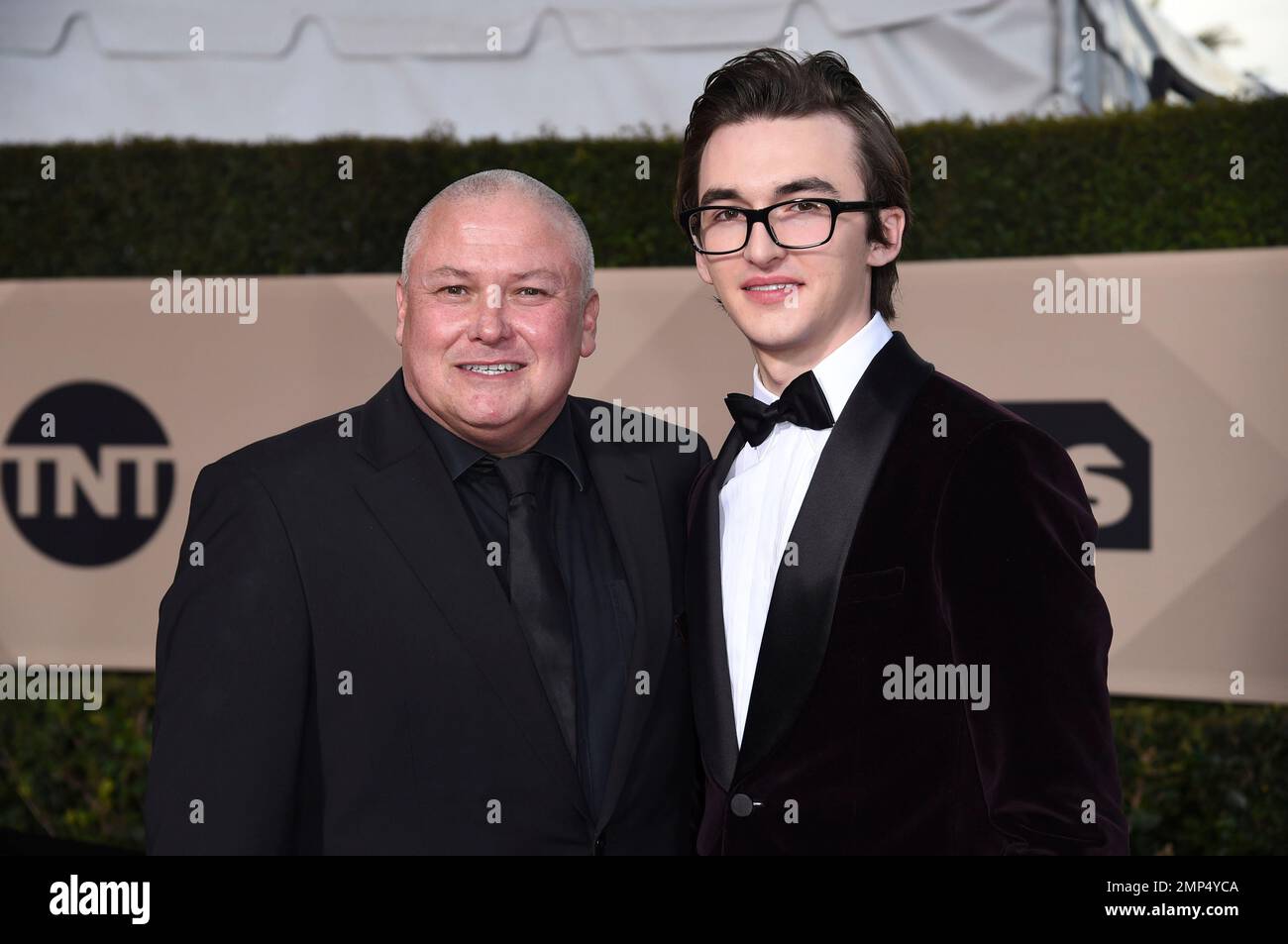 Conleth Hill, left, and Isaac Hempstead Wright arrive at the 24th ...
