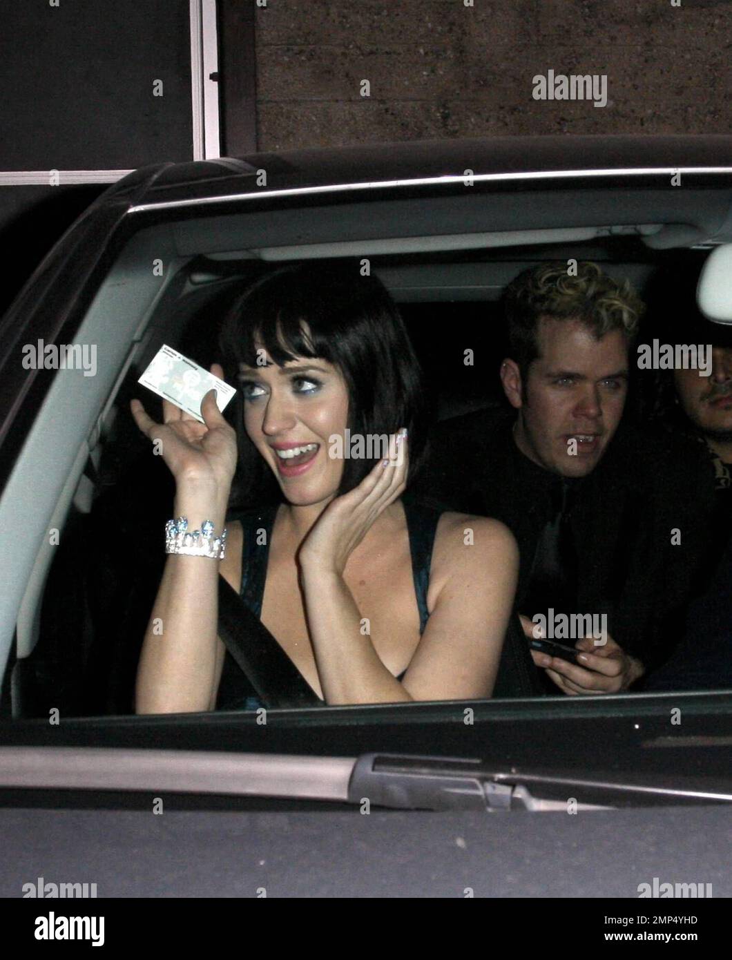 Singer Katy Perry signs autographs as she leaves Bar Deluxe with ...