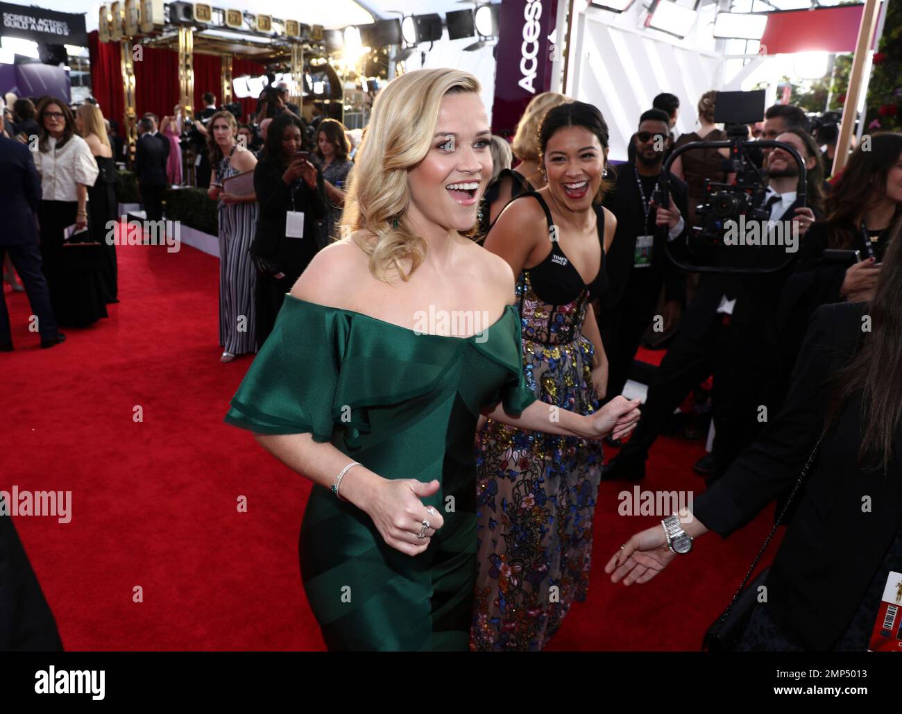 Reese Witherspoon, left, and Gina Rodriguez arrive at the 24th annual ...
