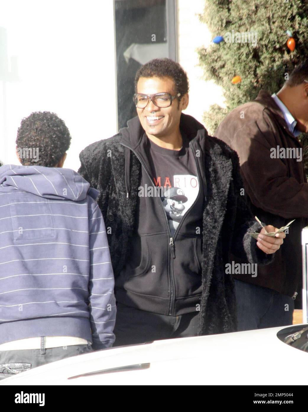 Actor Mario Van Peebles wears a Super Mario t-shirt as he gets in some ...