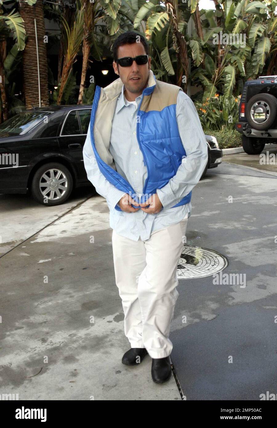 Adam Sandler arrives at the Staples Center for the Los Angeles Lakers ...
