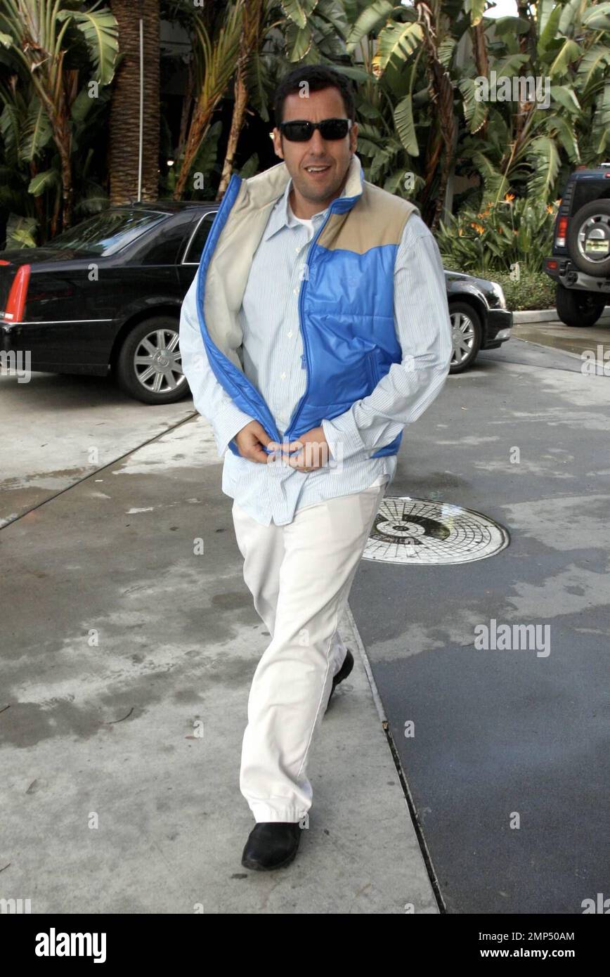 Adam Sandler arrives at the Staples Center for the Los Angeles Lakers ...