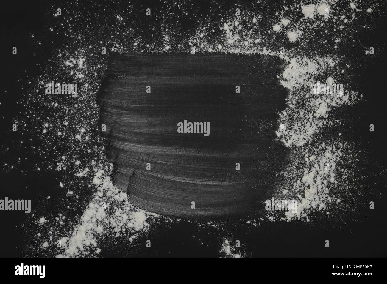 Frame made with flour on black table, top view. Space for text Stock ...