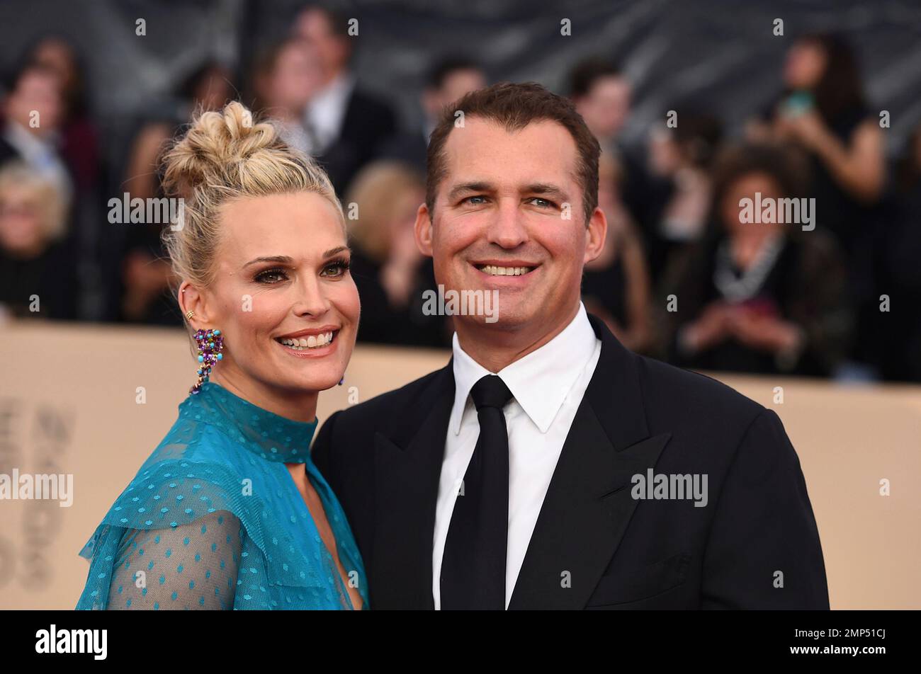 Molly Sims, left, and Scott Stuber arrive at the 24th annual Screen ...