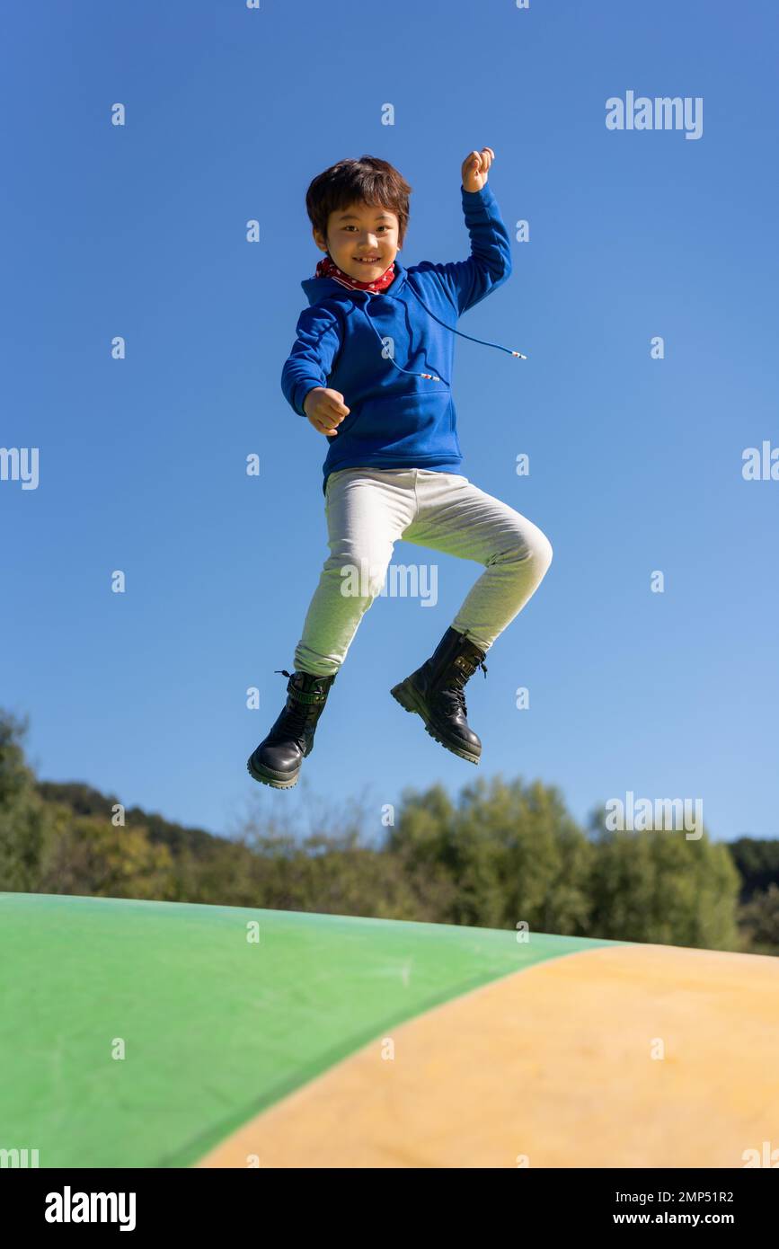 Boy jumps hi-res stock photography and images - Alamy