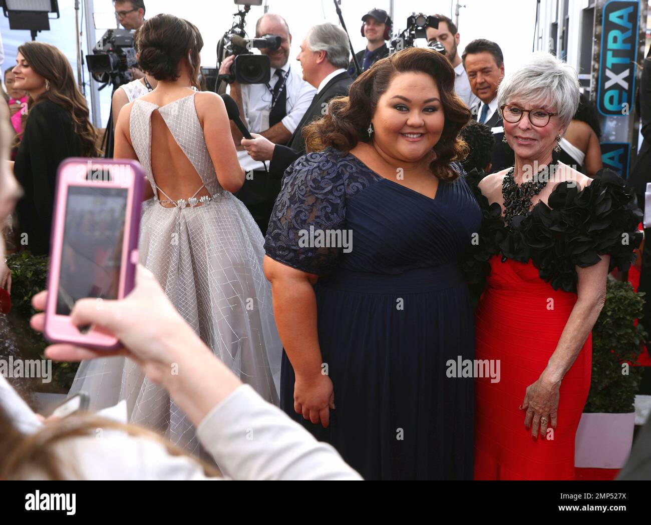 Jolene Purdy, left, and Rita Moreno pose for a cell phone photo as they ...
