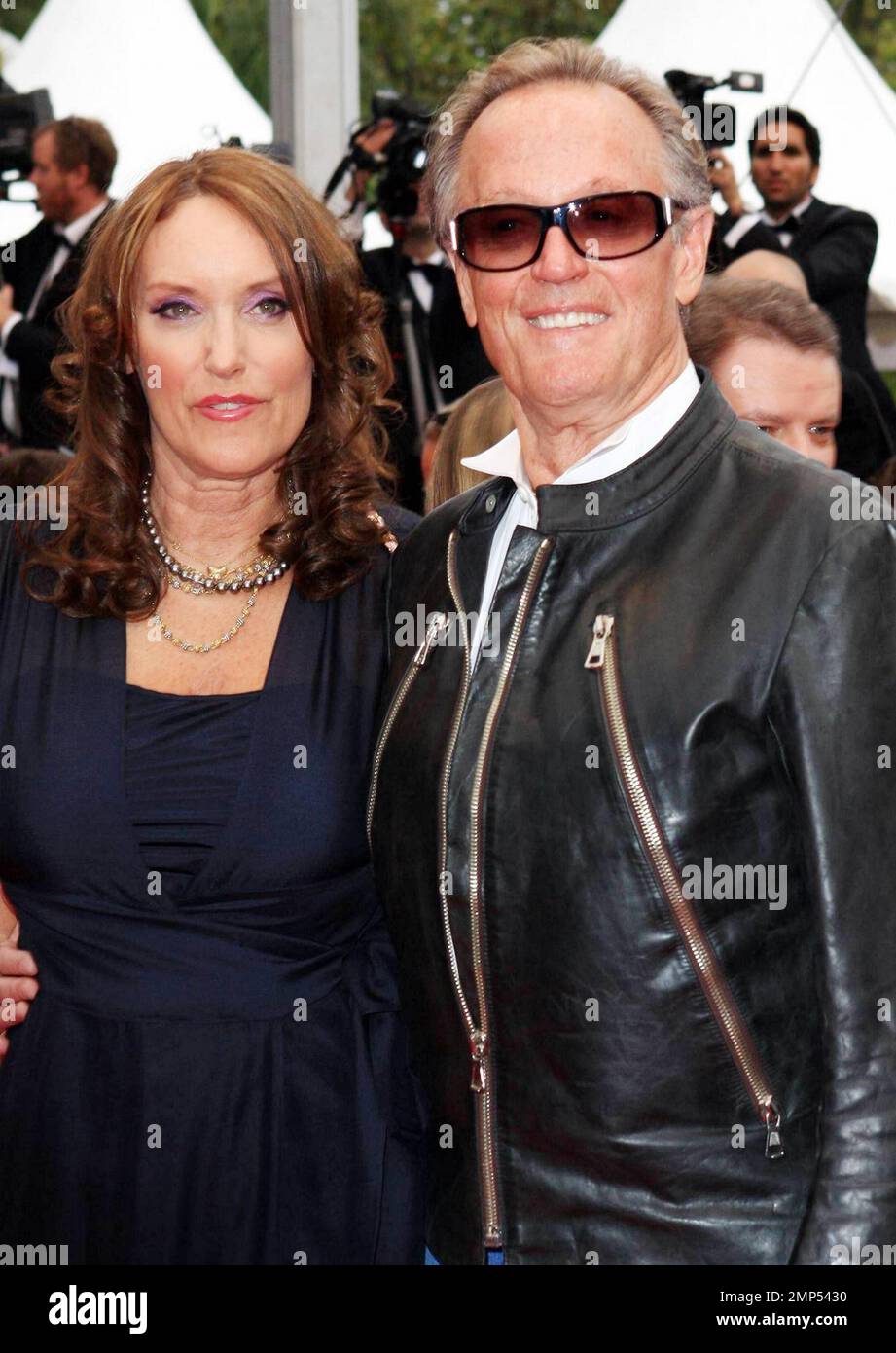 Parky DeVogelaere and Peter Fonda at the premiere of 'The Conquest' at ...