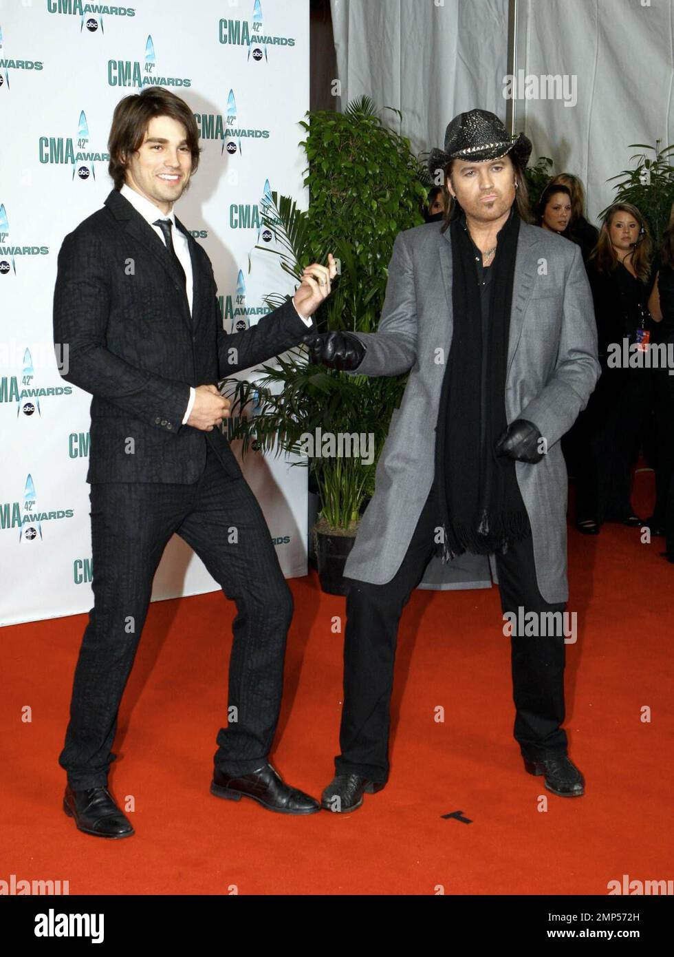 Billy Ray Cyrus and Miley Cyrus' boyfriend Justin Gaston attend the ...