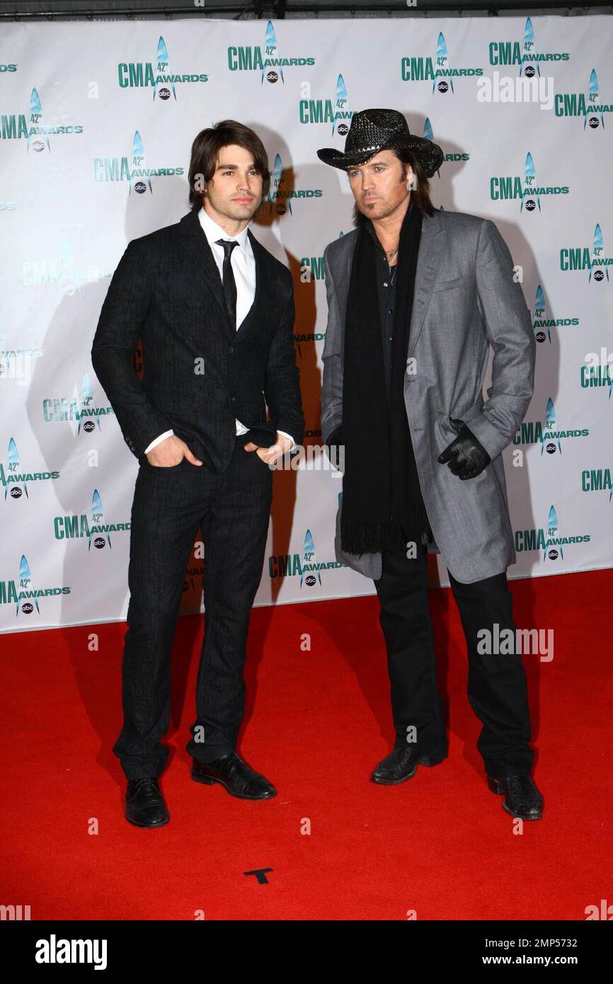 Billy Ray Cyrus and Miley Cyrus' boyfriend Justin Gaston attend the ...