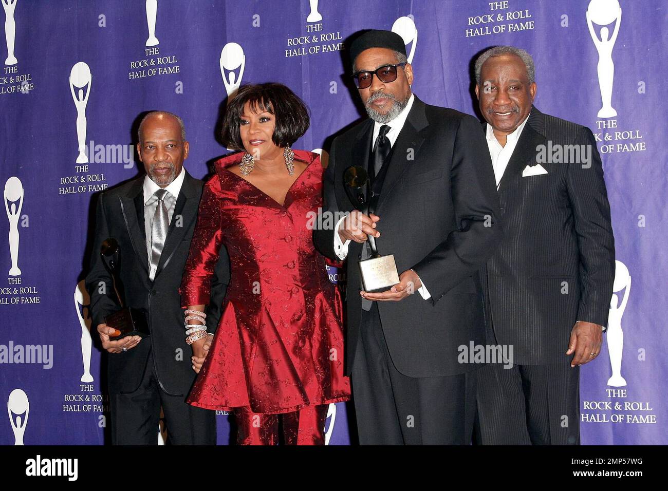 Singer Jerry Butler (C) poses with inductees Leon Huff (L), Patti ...