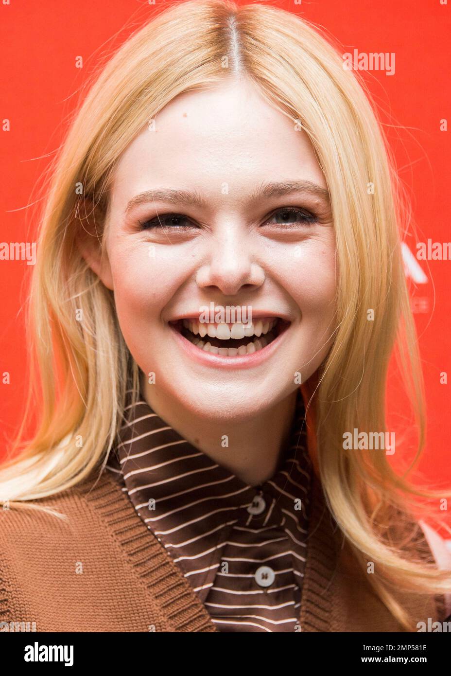 Actress Elle Fanning poses during the premiere of "I Think We're Alone ...
