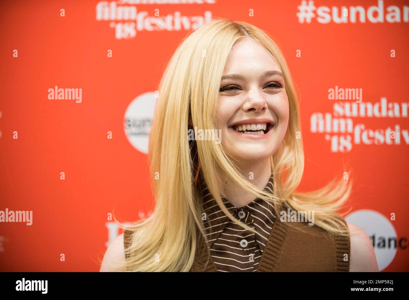 Actress Elle Fanning poses during the premiere of "I Think We're Alone ...