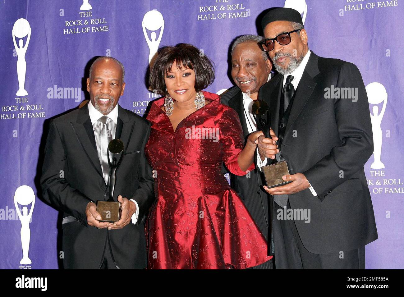 Singer Jerry Butler (C) poses with inductees Leon Huff (L), Patti ...