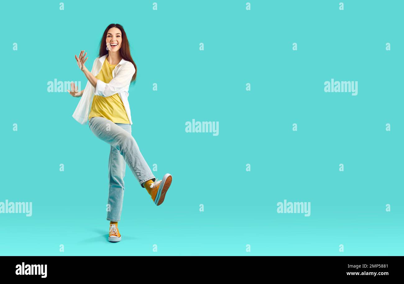 Funny girl have fun dancing in studio Stock Photo - Alamy