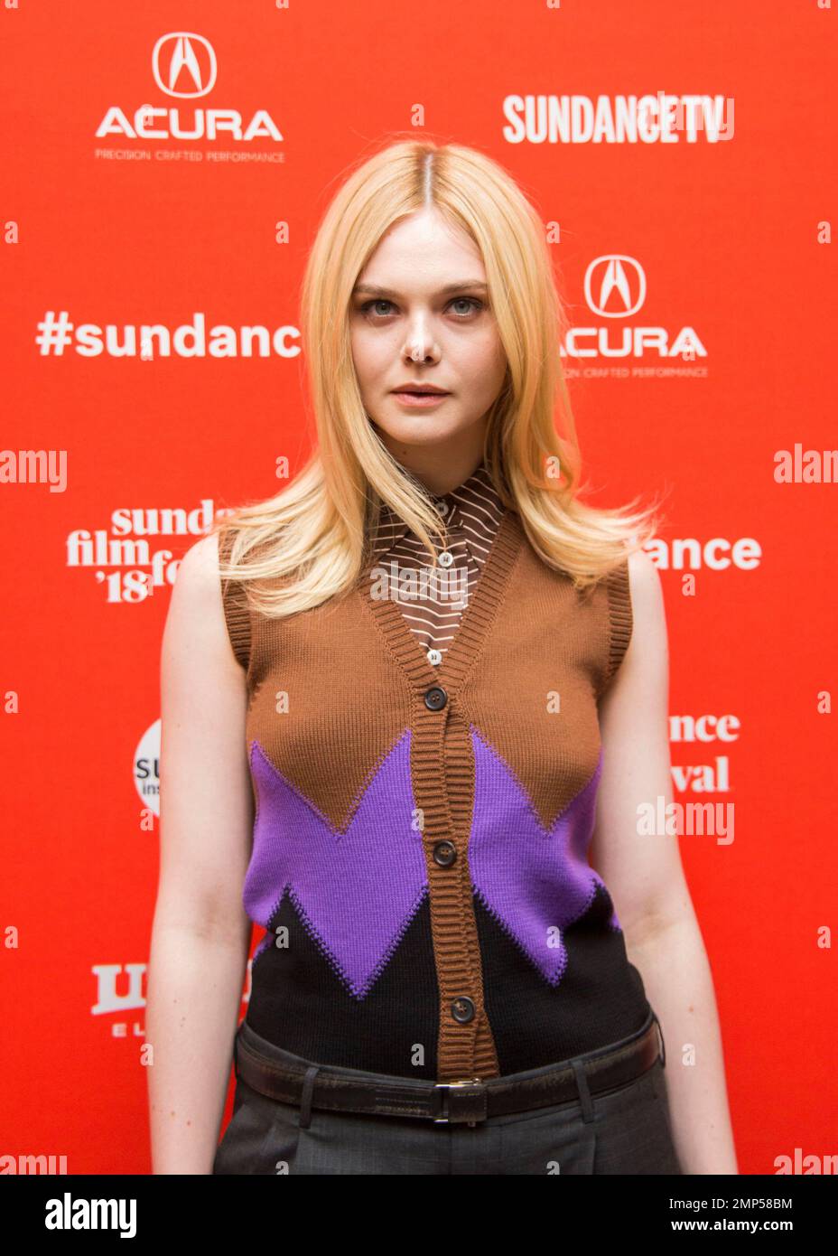 Actress Elle Fanning poses during the premiere of "I Think We're Alone ...