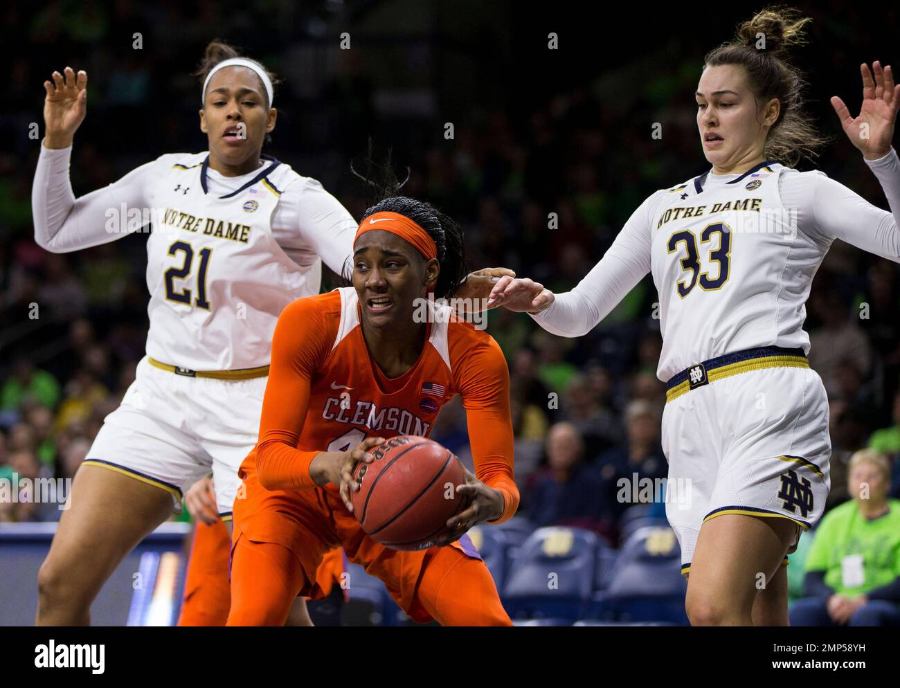 Clemson's Kobi Thornton, center, grabs a rebound between Notre Dame's ...