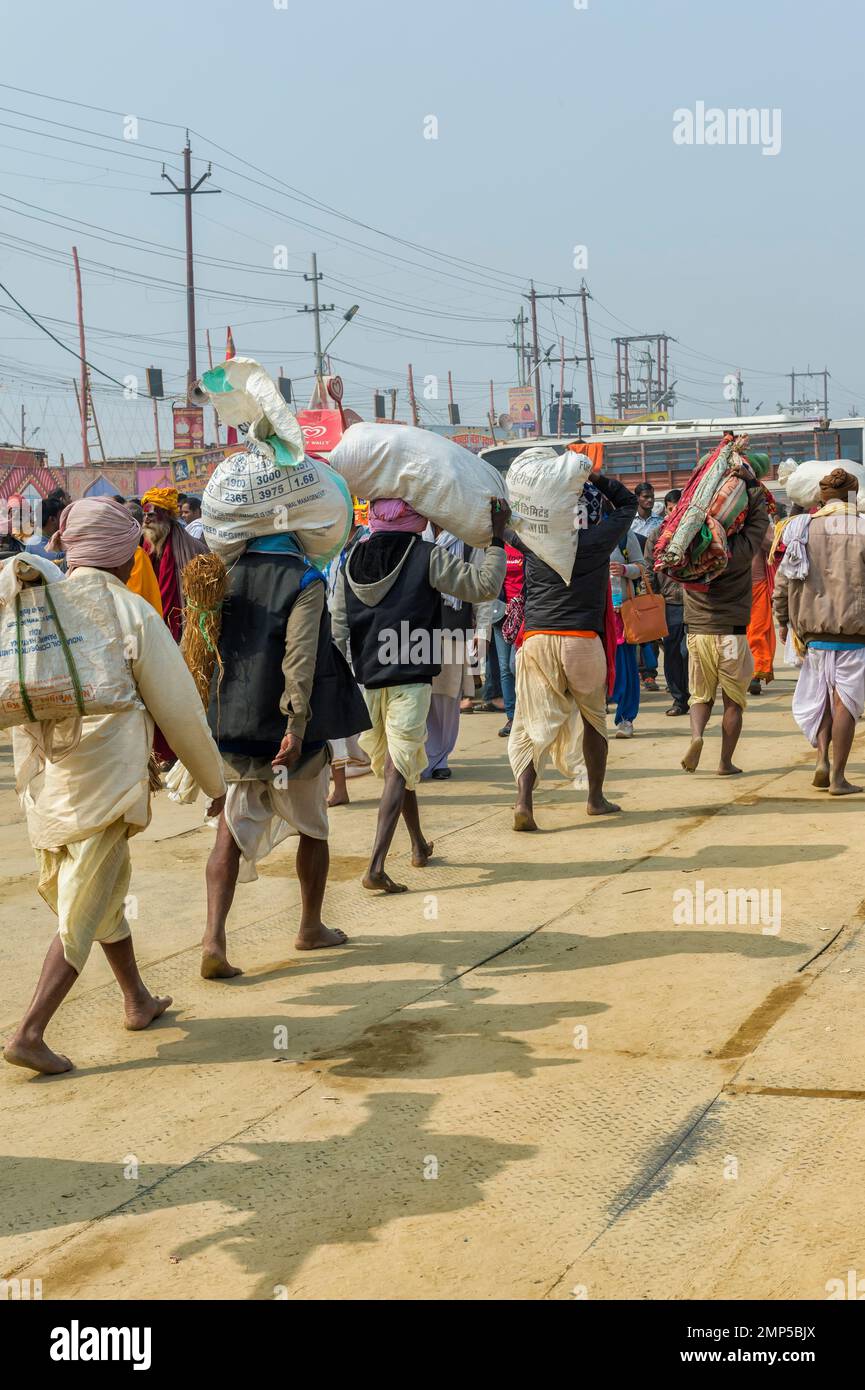 Pilgrims on the way to Allahabad Kumbh Mela, World’s largest religious ...