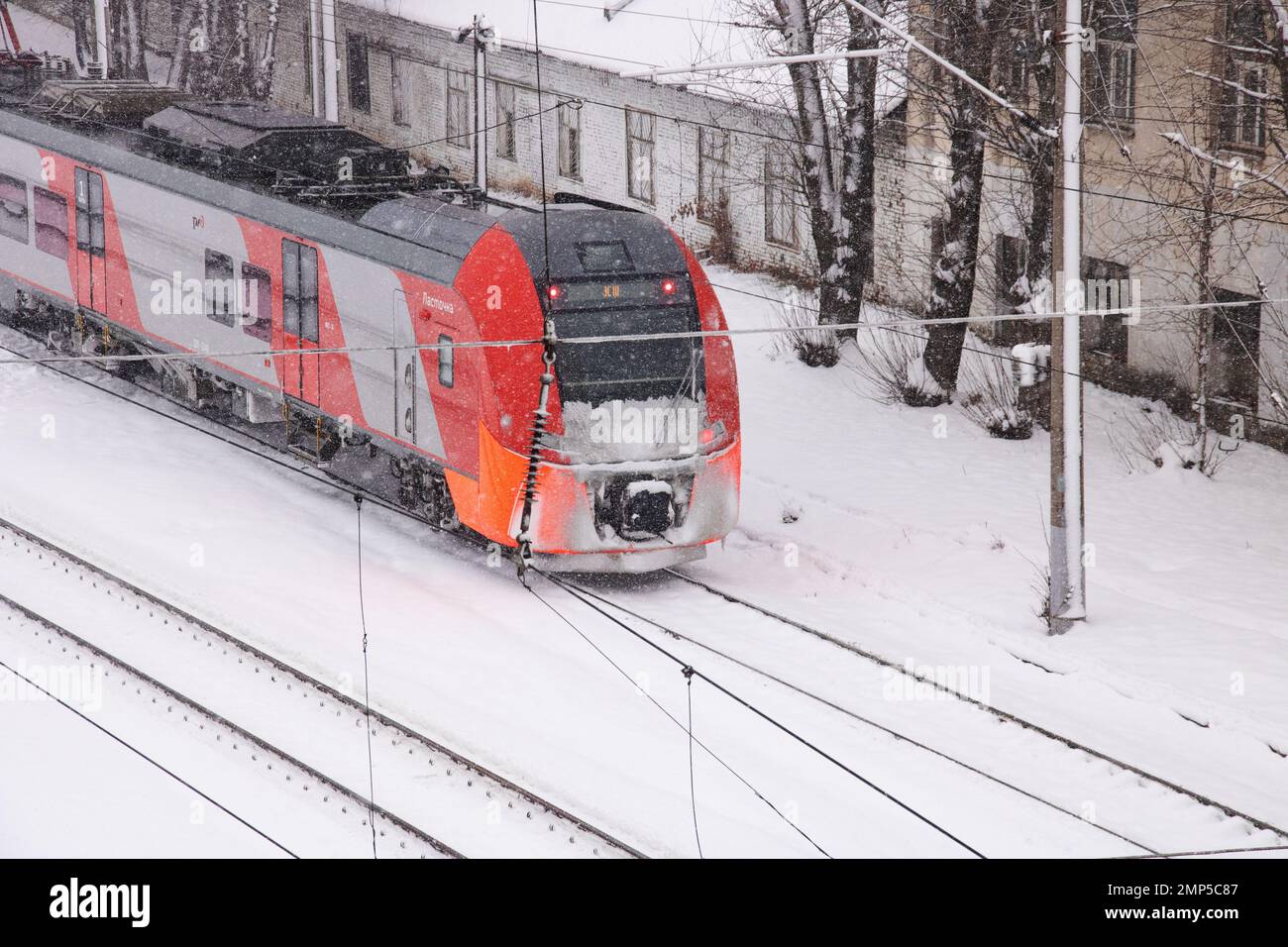 Belarus, Minsk - 18 december, 2022: High-speed train among the snow ...