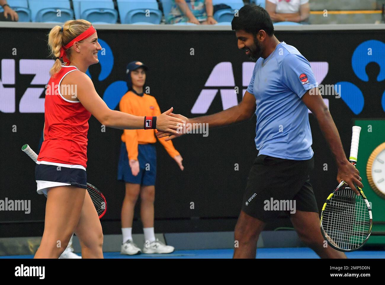 Hungary's Timea Babos and India's Rohan Bopanna exchange gesture in ...