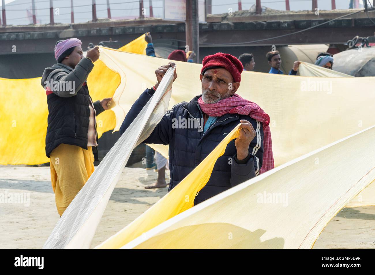 Pilgrims stretching out washing to dry, Allahabad Kumbh Mela, World’s ...