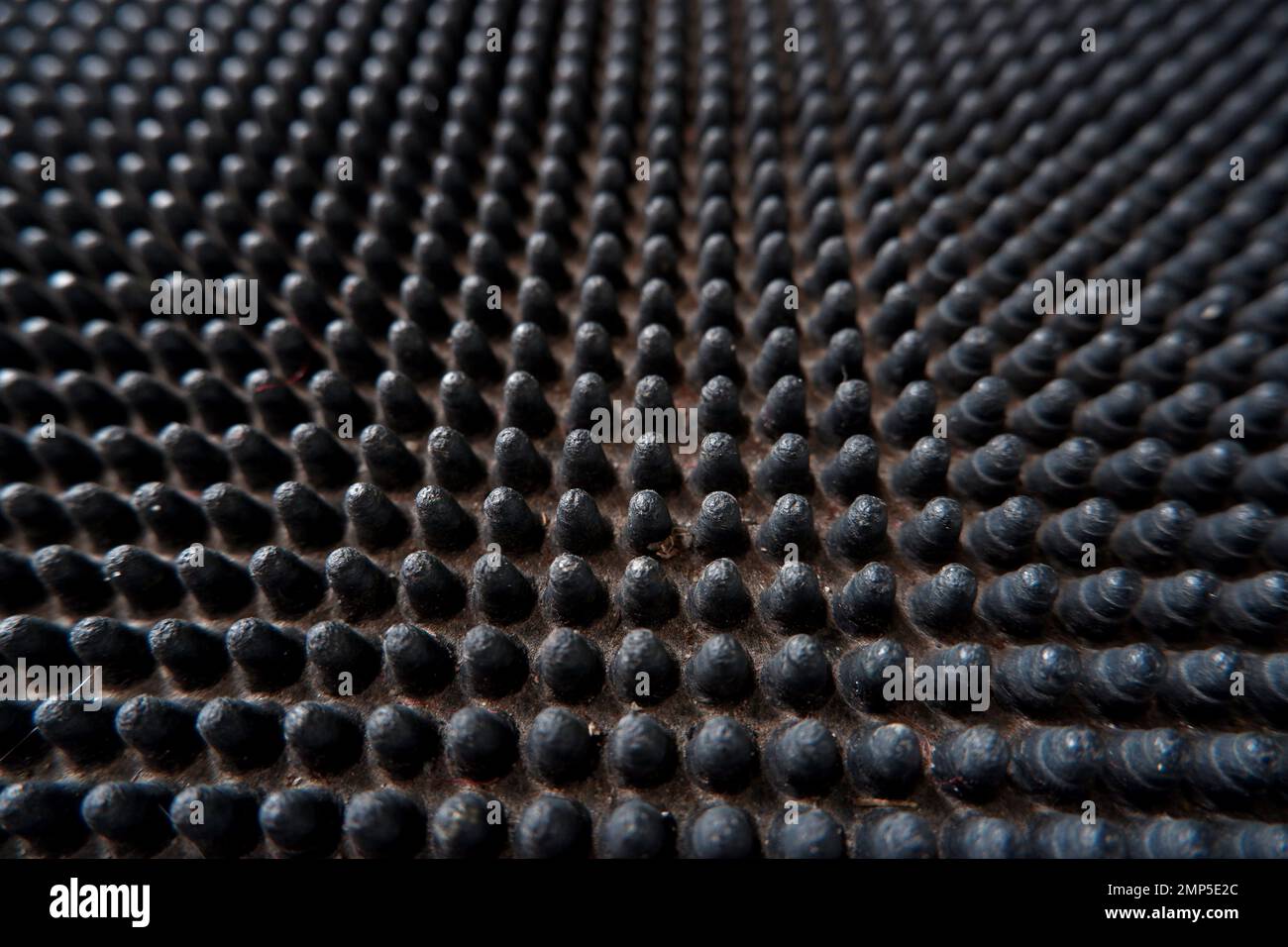 Close-up View, At 45 Degree Angle, Of Black Rubber Foot Mat Texture ...