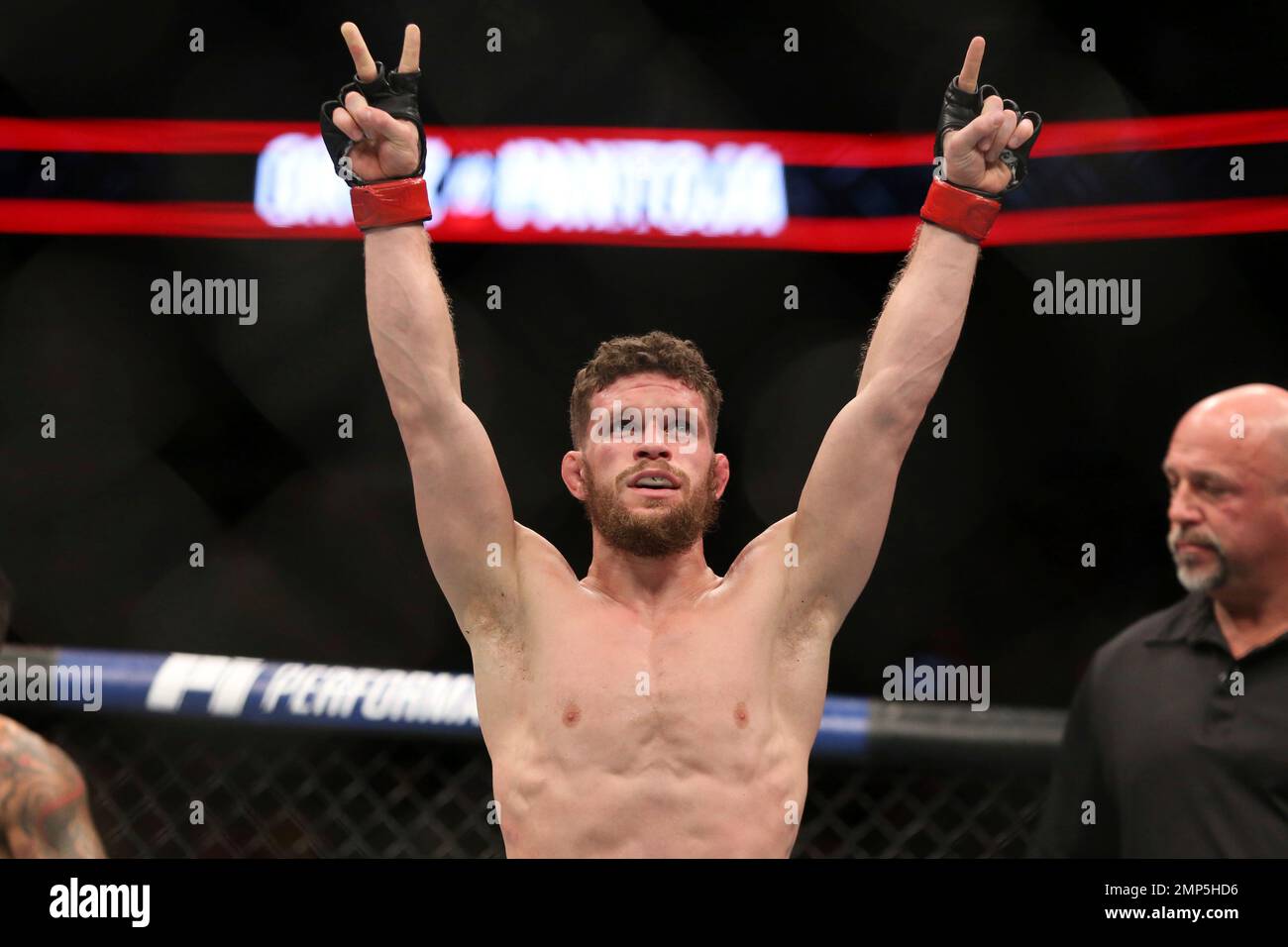 Dustin Ortiz celebrates a win over Alexandre Pantoja after a mixed ...