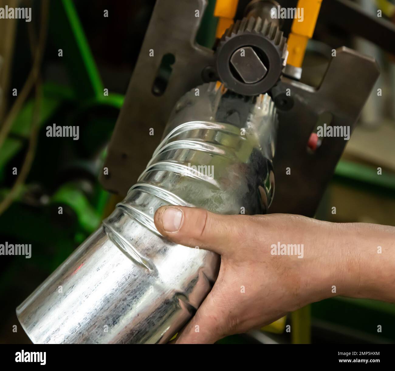 the machine for production of products from a plate during work Stock ...