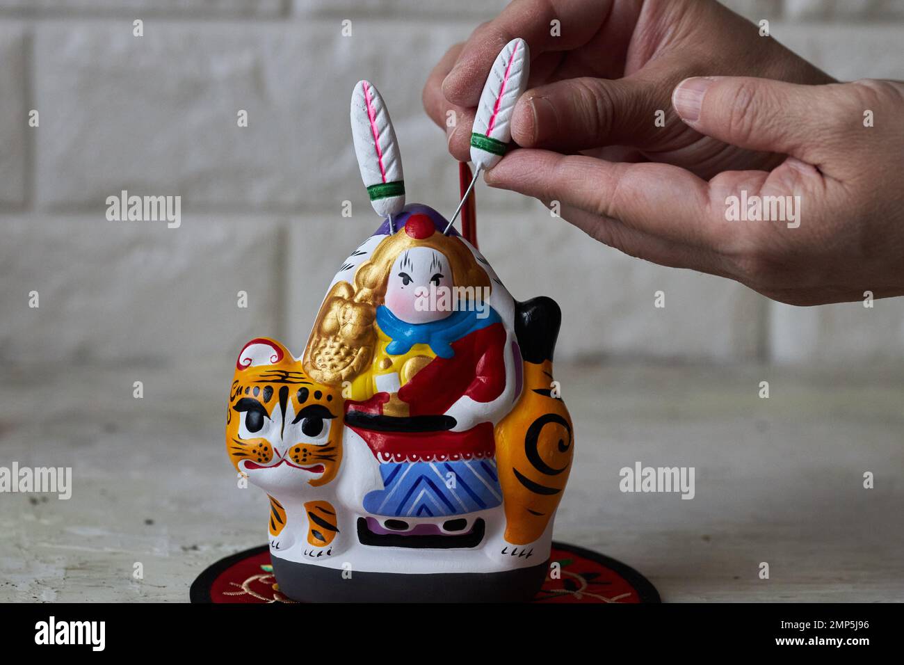 Chinese traditional handmade craftwork 'Tu'er Ye' or Rabbit God Stock ...