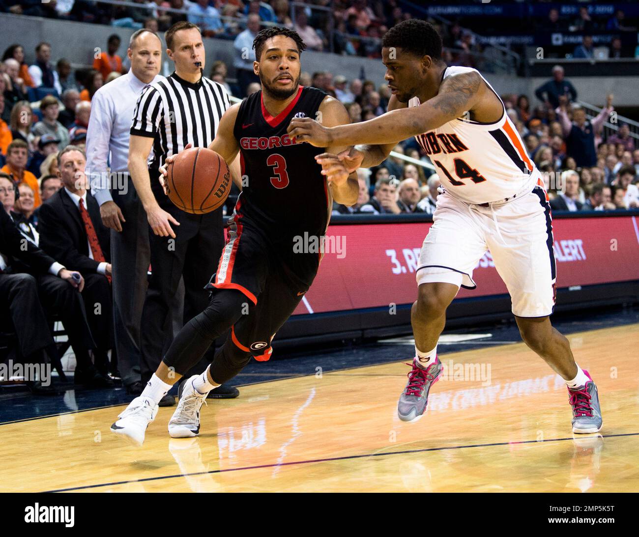 Georgia guard Juwan Parker (3) drives on Auburn guard Malik Dunbar (14 ...