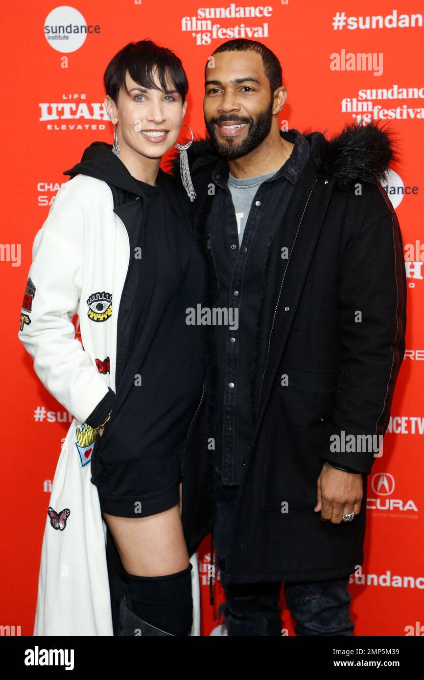 Actor Omari Hardwick, right, and his wife Jennifer Pfautch, left, pose at the premiere of "Sorry ...