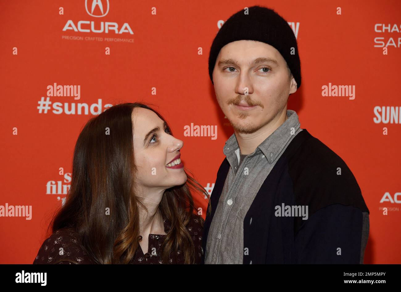 Paul Dano, right, director/co-writer of "Wildlife," arrives with his ...